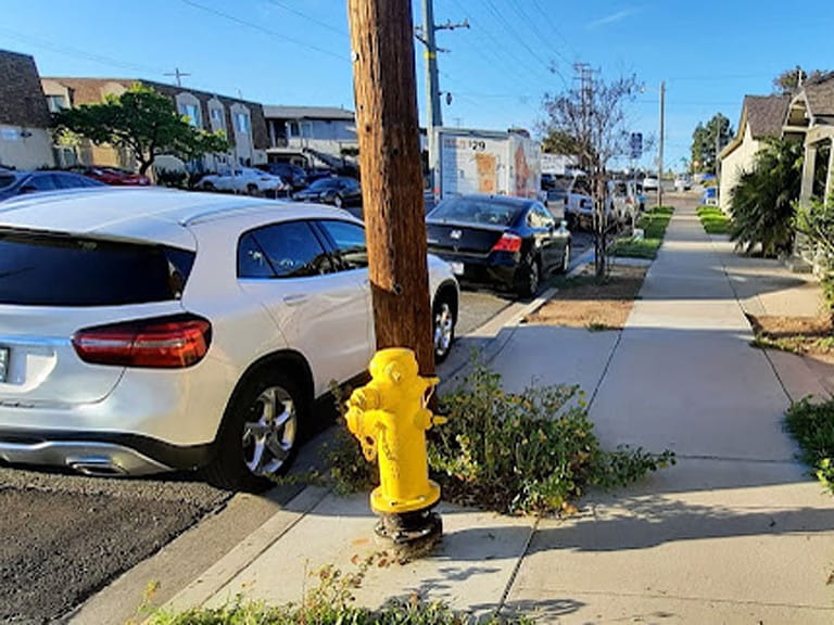My Neighbor Has Too Many Cars Parked On The Street